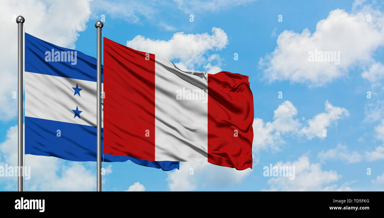 Honduras and Peru flag waving in the wind against white cloudy blue sky ...