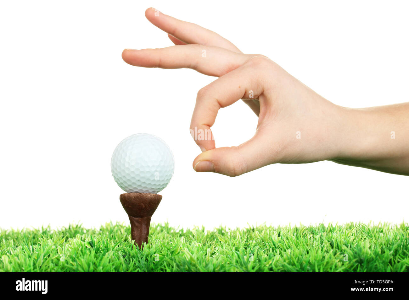 Golf ball and hand isolated on white Stock Photo - Alamy