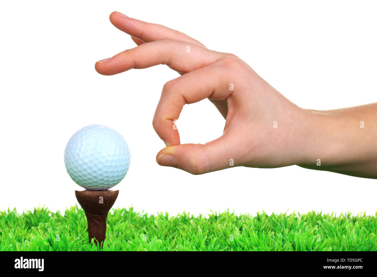 Golf ball and hand isolated on white Stock Photo - Alamy