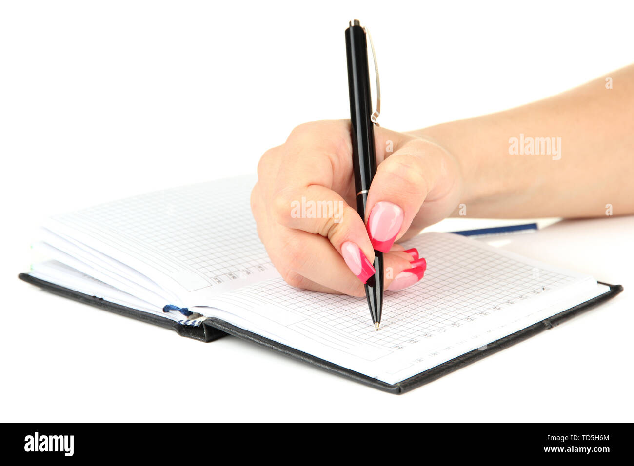 Hand signing in notebook, isolated on white Stock Photo - Alamy