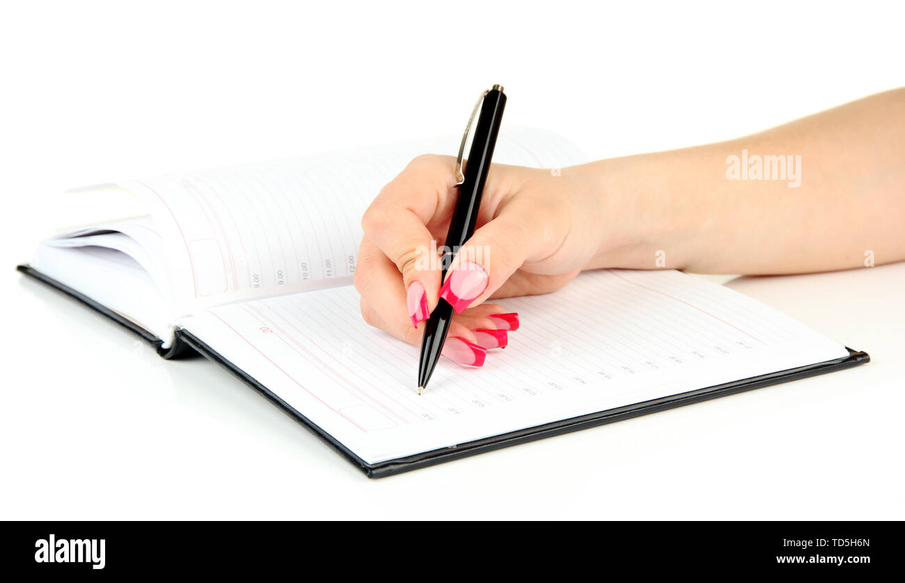 Hand signing in notebook, isolated on white Stock Photo - Alamy