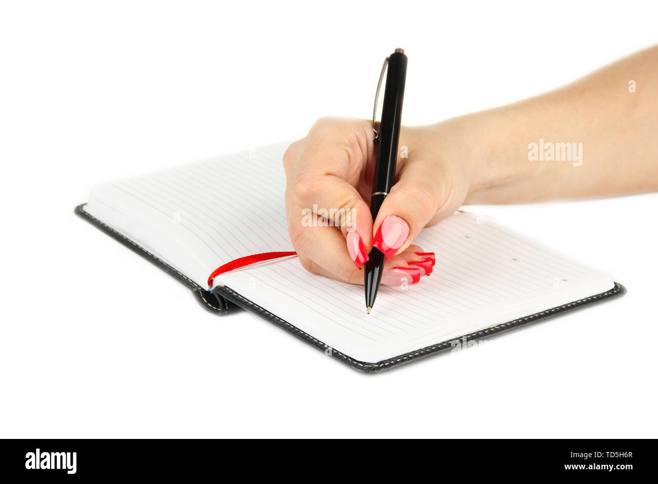 Hand signing in notebook, isolated on white Stock Photo - Alamy