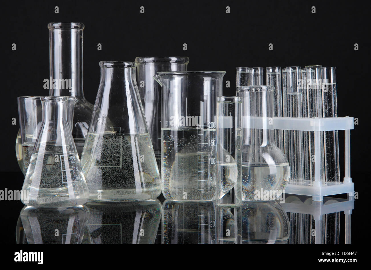 Test tubes on black background Stock Photo - Alamy