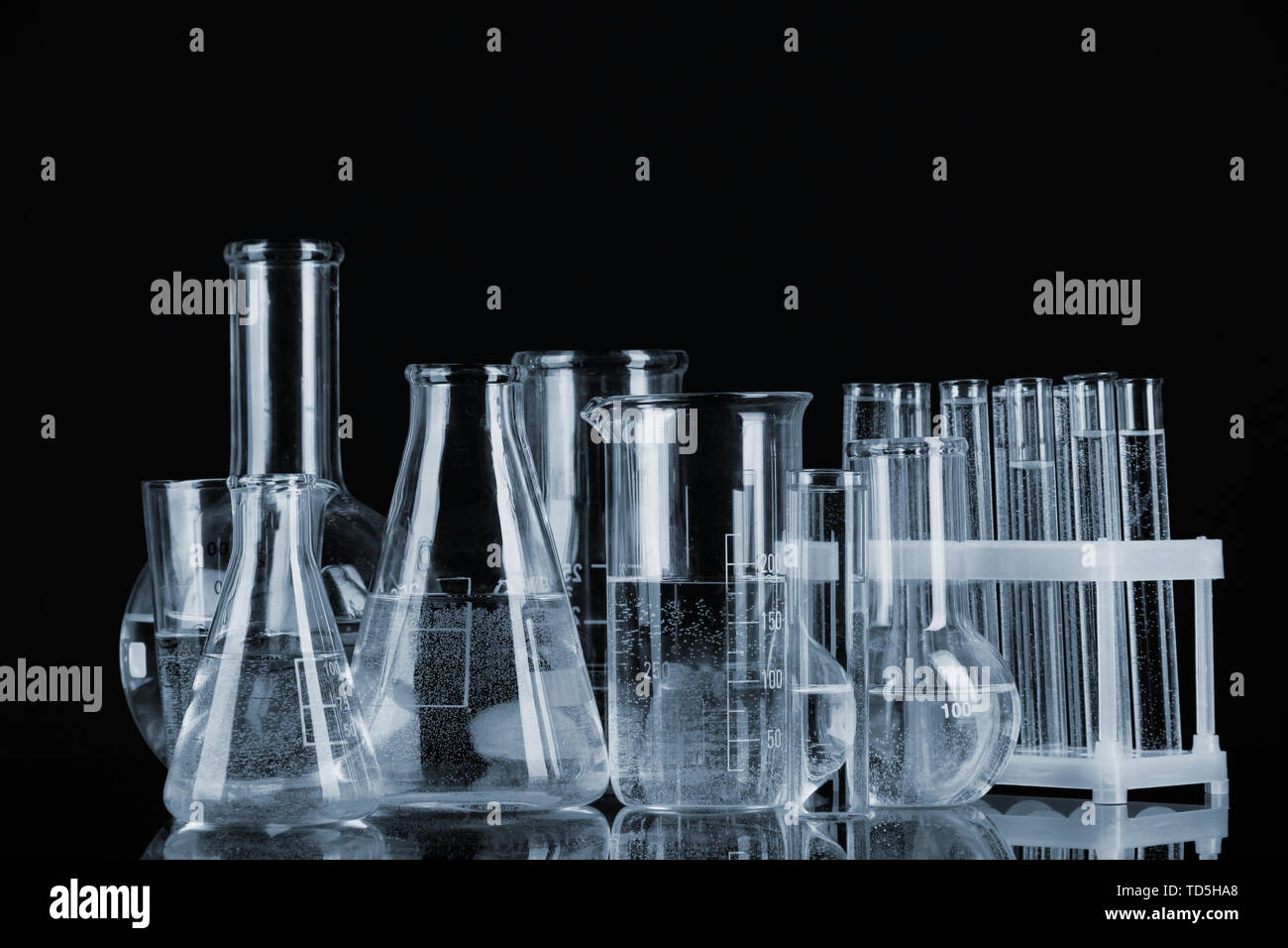 Test tubes on black background Stock Photo - Alamy