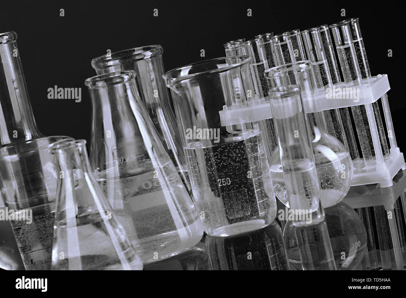 Test tubes on black background Stock Photo - Alamy