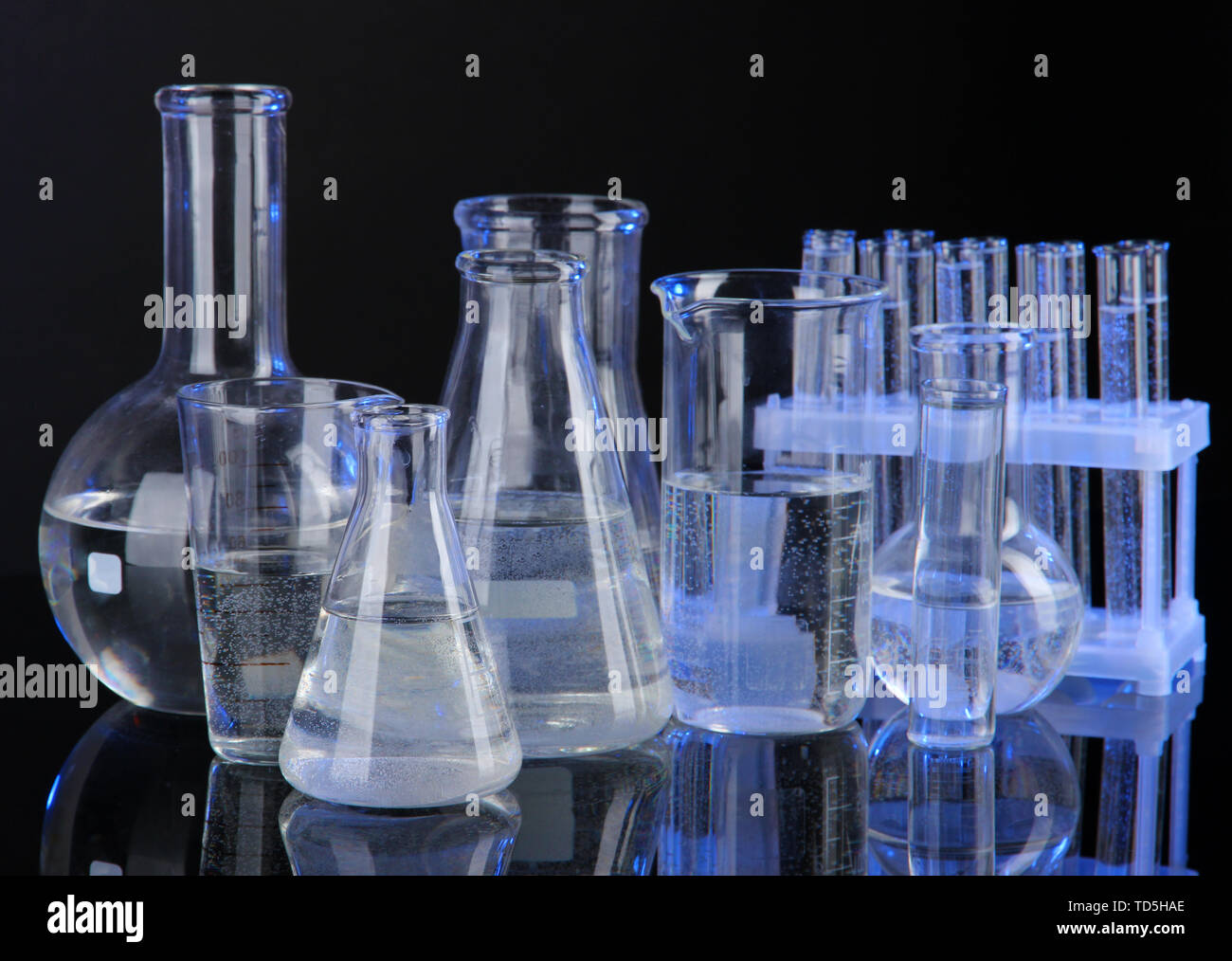 Test tubes on black background Stock Photo - Alamy