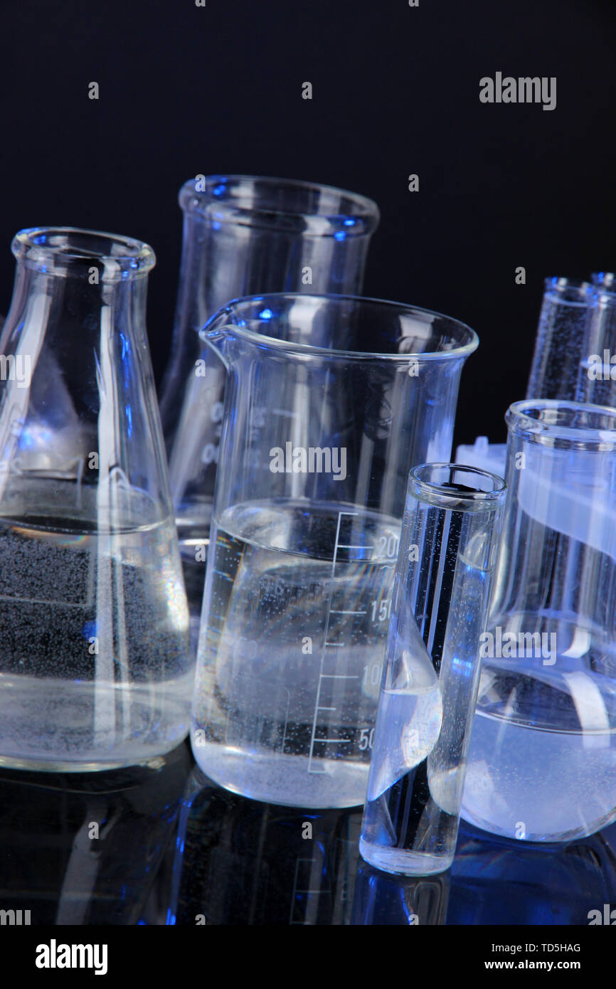 Test tubes on black background Stock Photo - Alamy