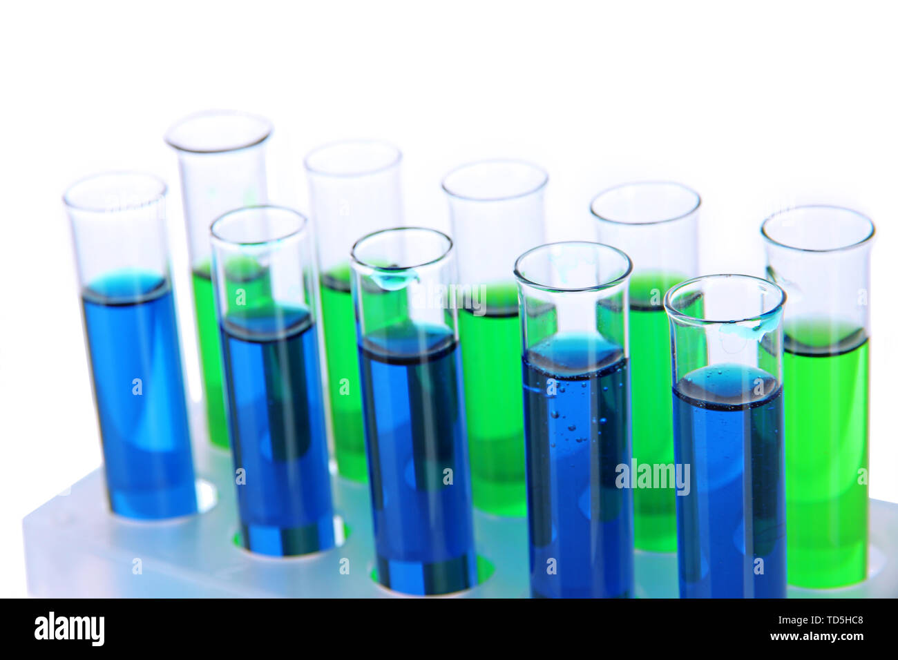 Identical test tubes isolated on white Stock Photo - Alamy