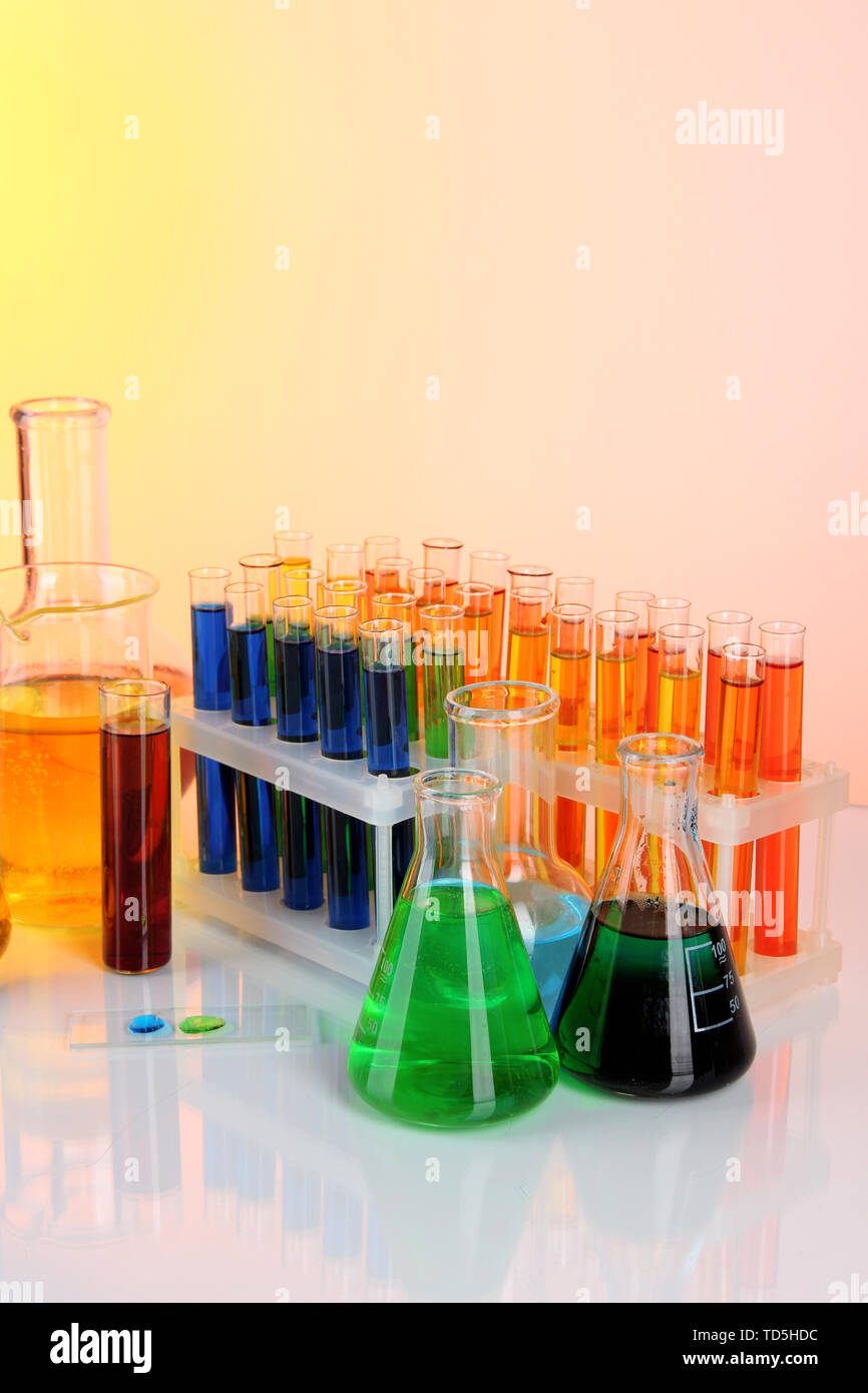Colorful test tubes on light background Stock Photo - Alamy