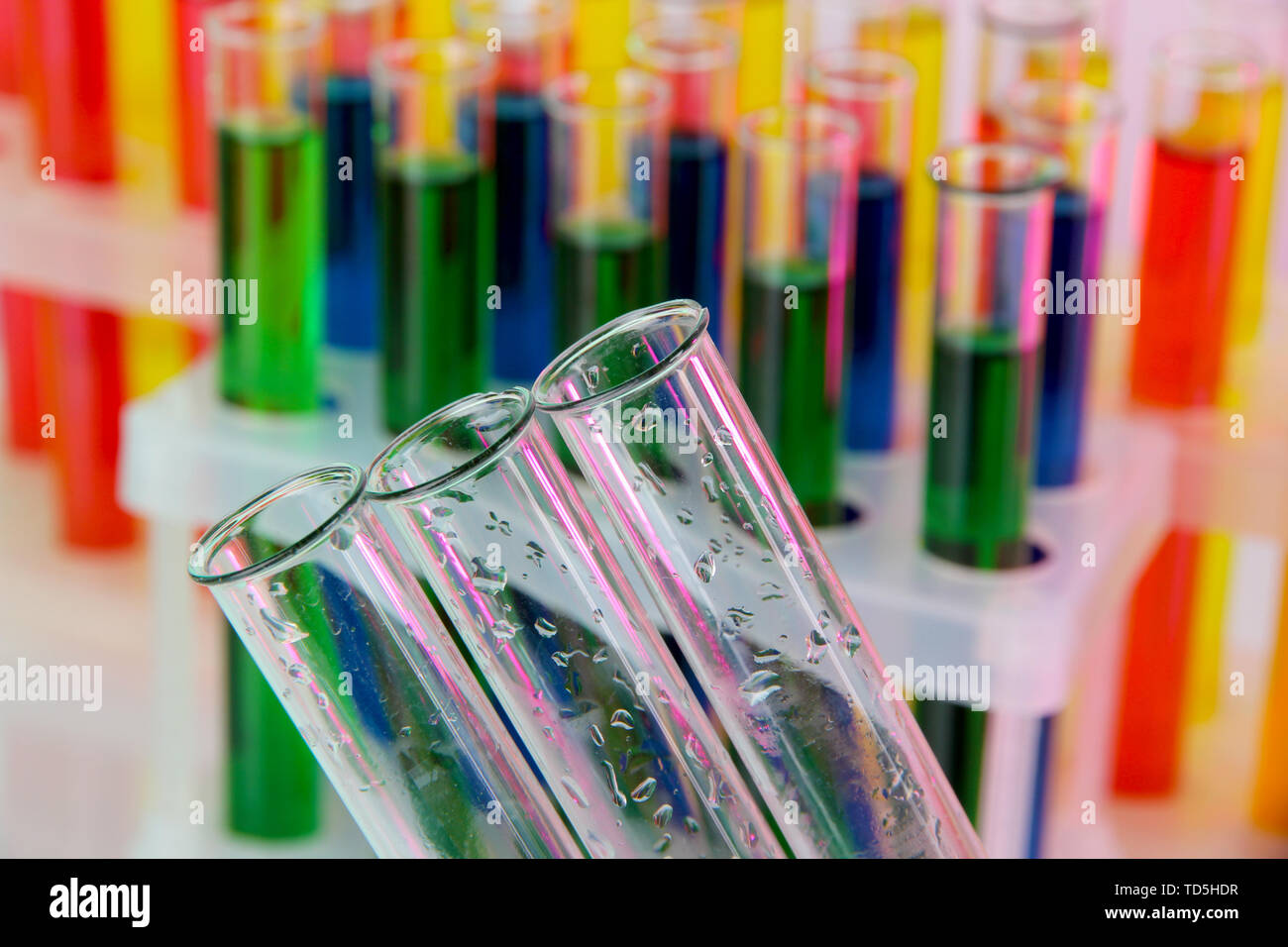 Empty and colorful test tubes close-up Stock Photo - Alamy