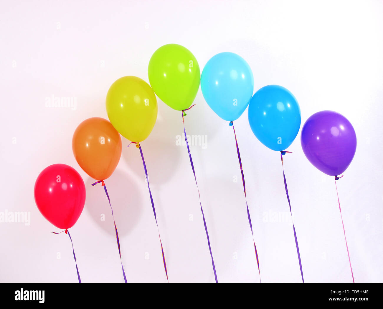 Rainbow of balloons isolated on white Stock Photo - Alamy