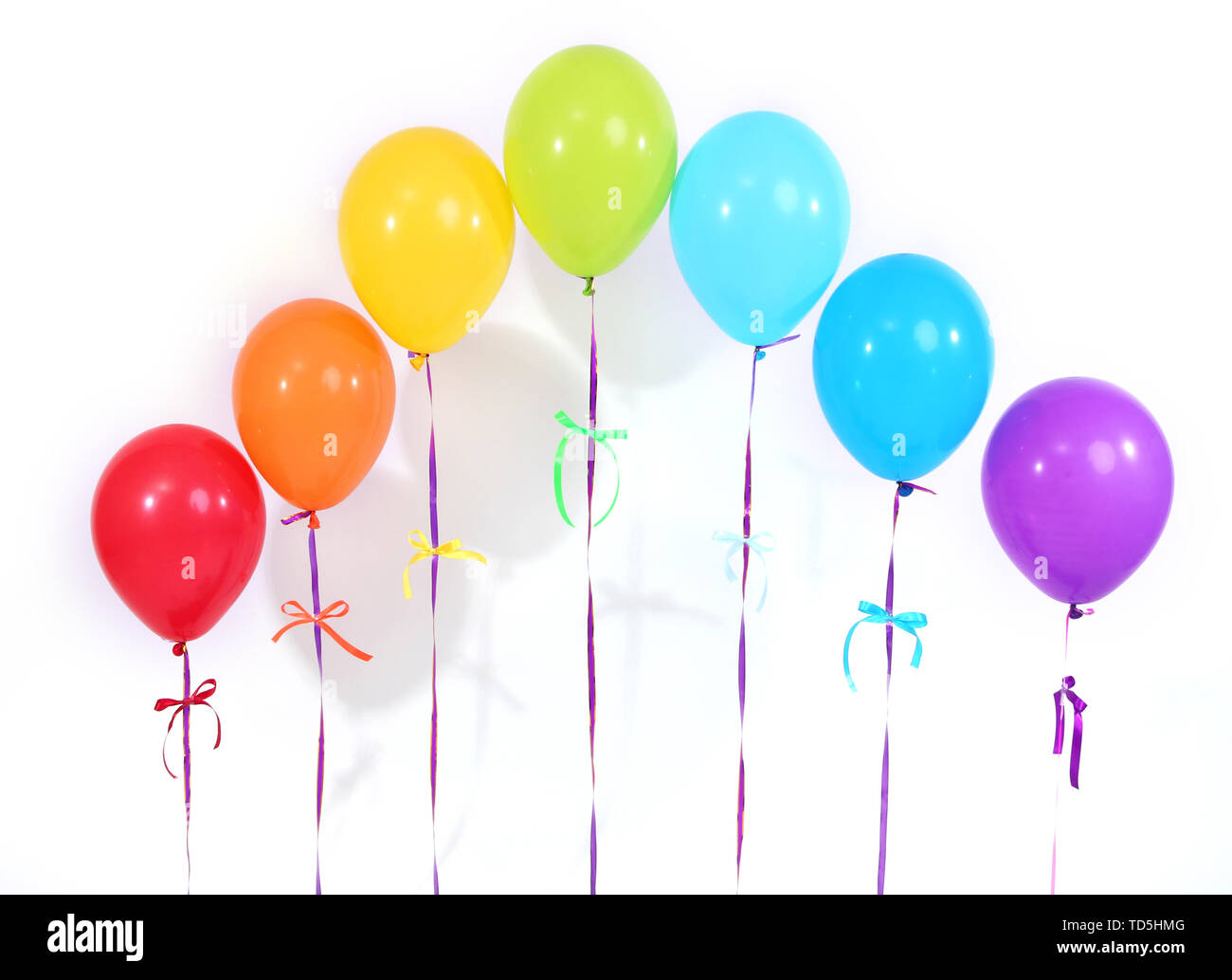 Rainbow of balloons isolated on white Stock Photo - Alamy