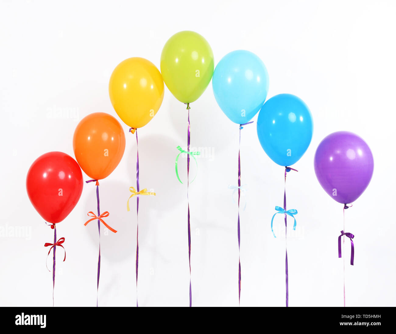 Rainbow of balloons isolated on white Stock Photo - Alamy