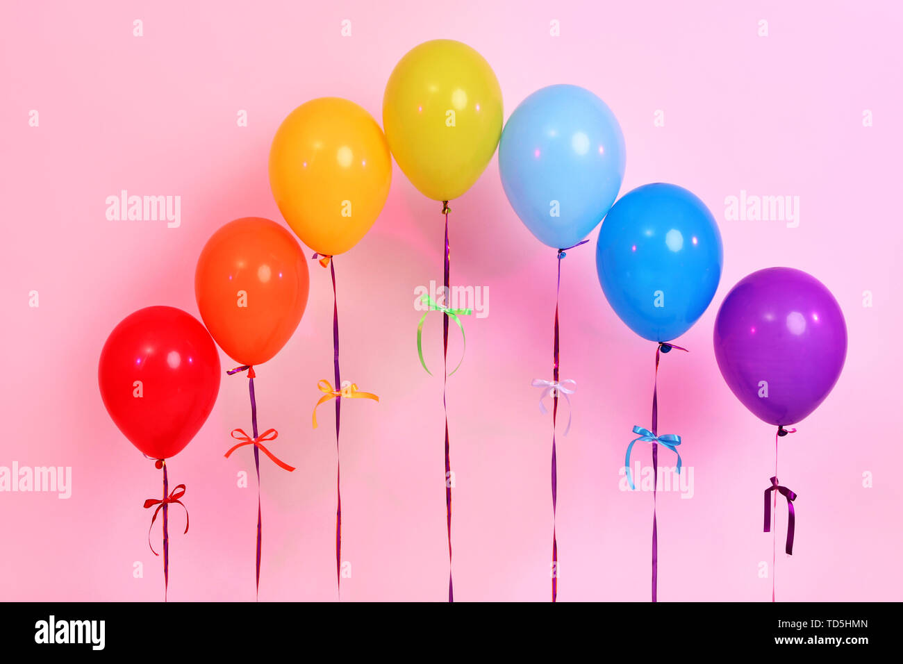 Rainbow of balloons hi-res stock photography and images - Alamy