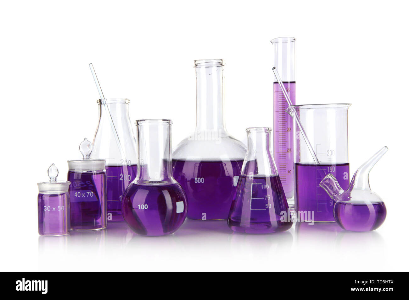 Test-tubes with purple liquid isolated on white Stock Photo - Alamy