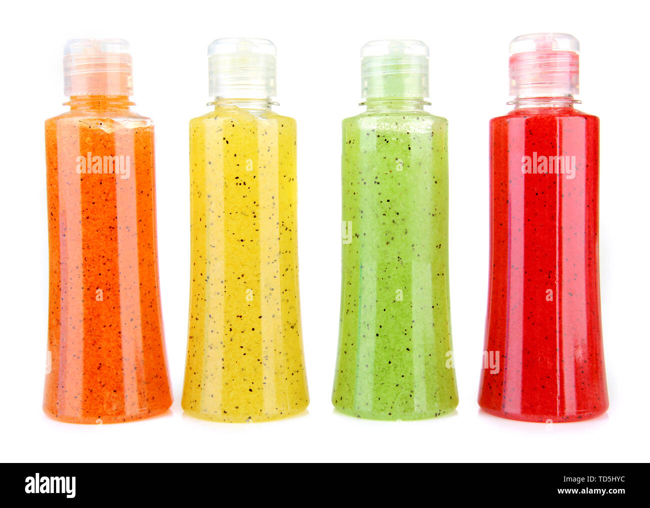 Bottles with scrub isolated on white Stock Photo - Alamy