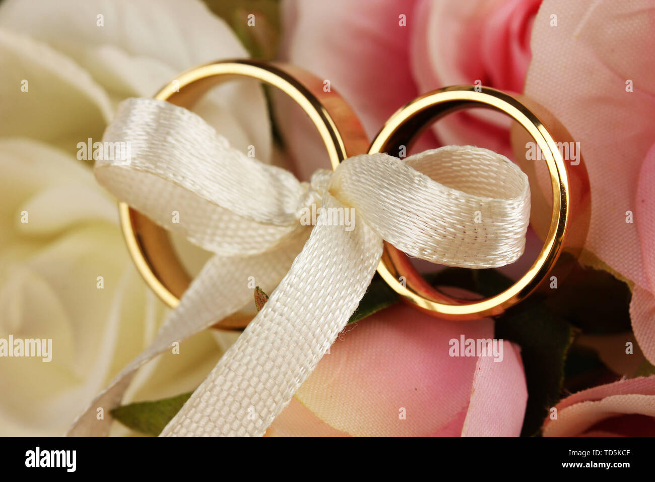 Silver ring tied with ribbon hi-res stock photography and images - Alamy