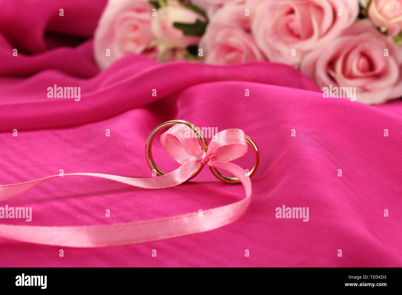 Silver ring tied with ribbon hi-res stock photography and images - Alamy