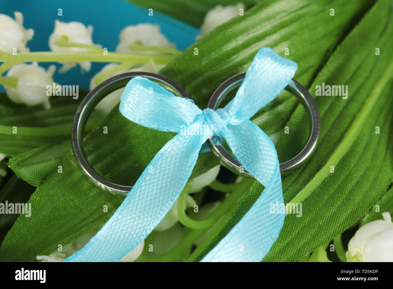Silver ring tied with ribbon hi-res stock photography and images - Alamy