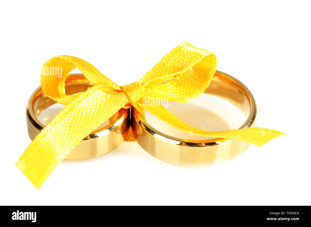 Wedding rings gold cloth background Cut Out Stock Images & Pictures - Alamy
