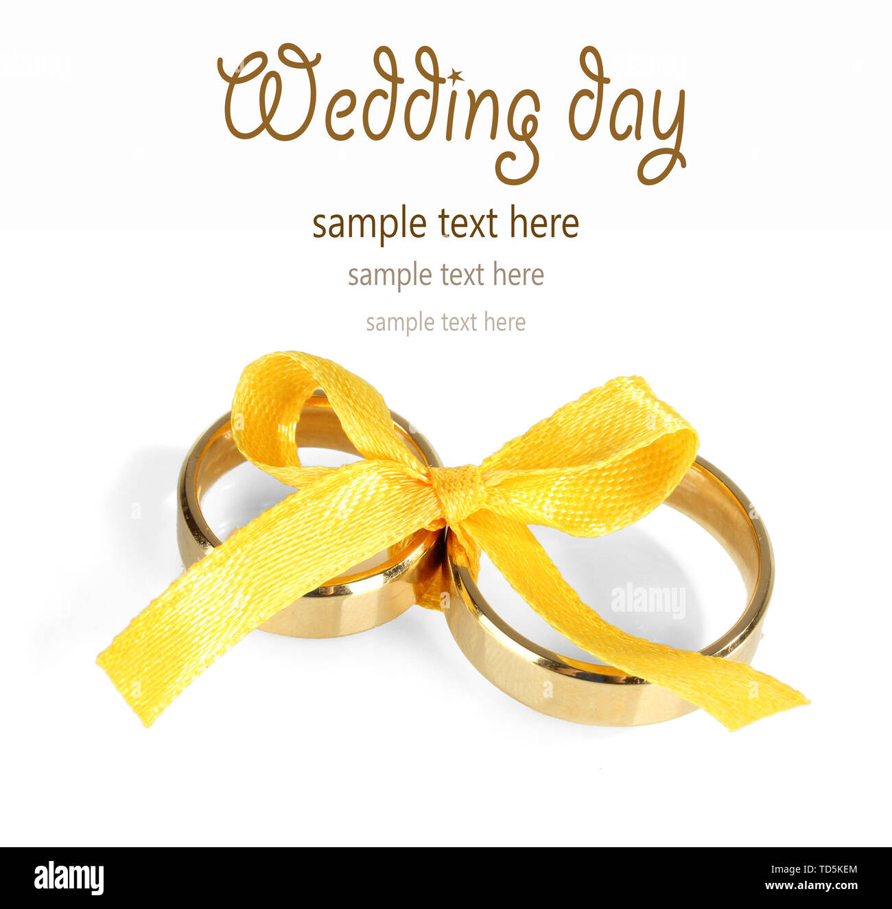 Wedding rings tied with ribbon isolated on white Stock Photo - Alamy