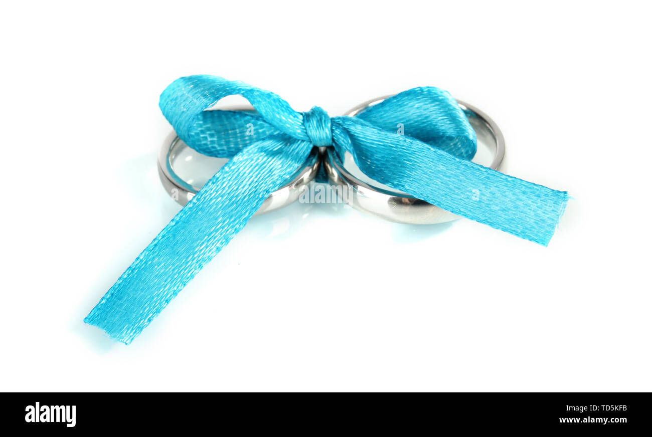 Wedding rings tied with ribbon isolated on white Stock Photo - Alamy