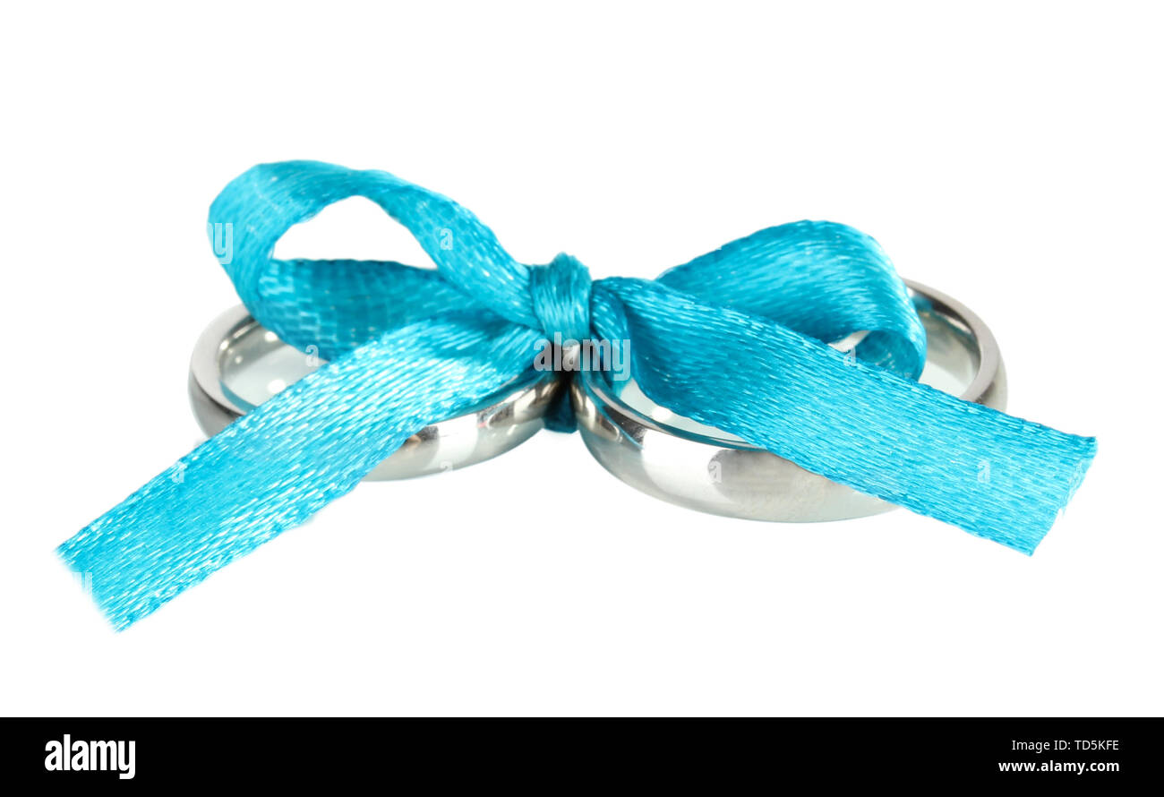 Wedding rings tied with ribbon isolated on white Stock Photo - Alamy