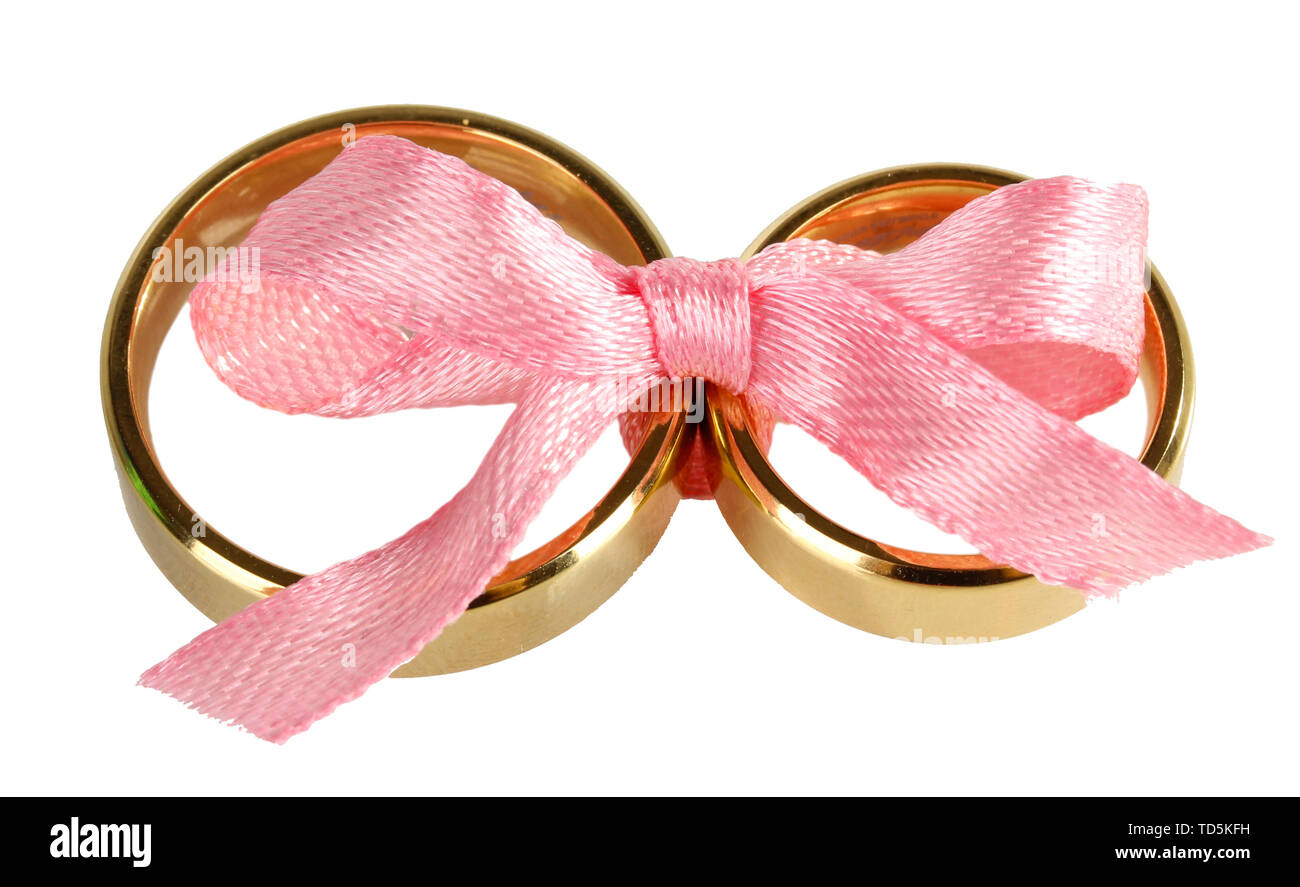 Wedding rings tied with ribbon isolated on white Stock Photo - Alamy