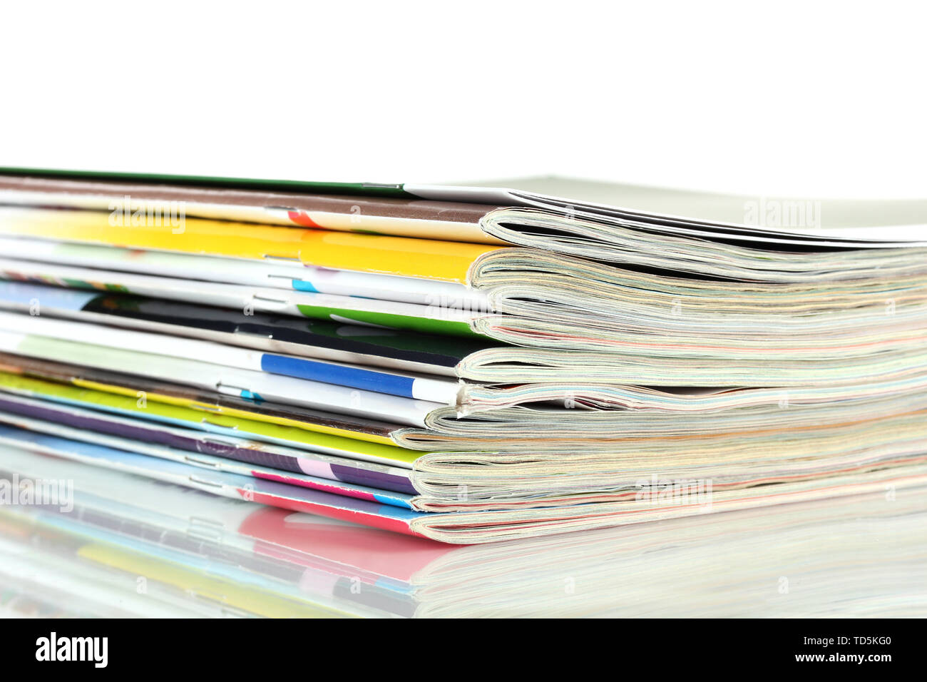Many magazines isolated on white Stock Photo - Alamy