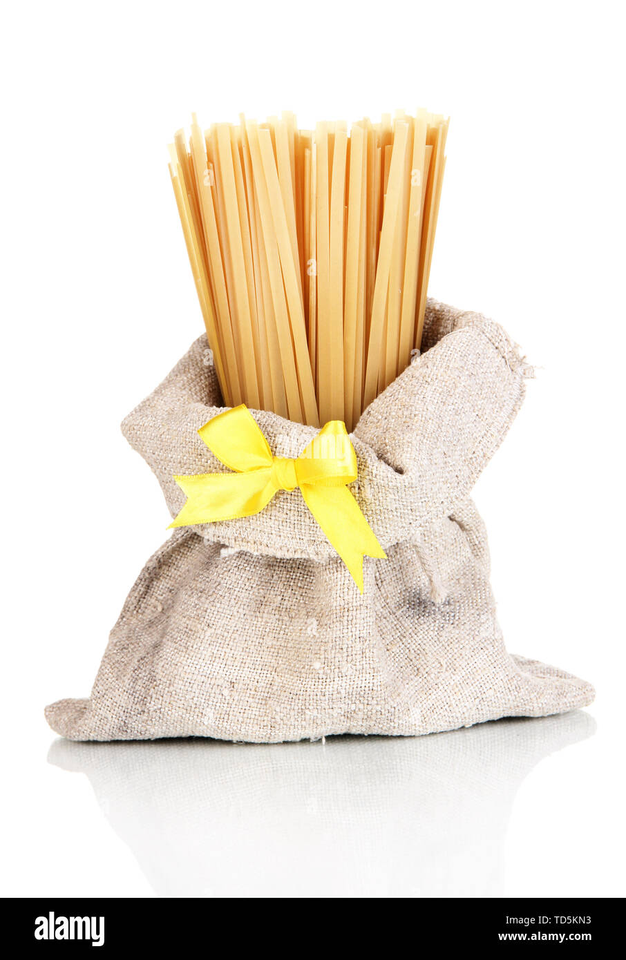Pasta in bag isolated on white Stock Photo - Alamy