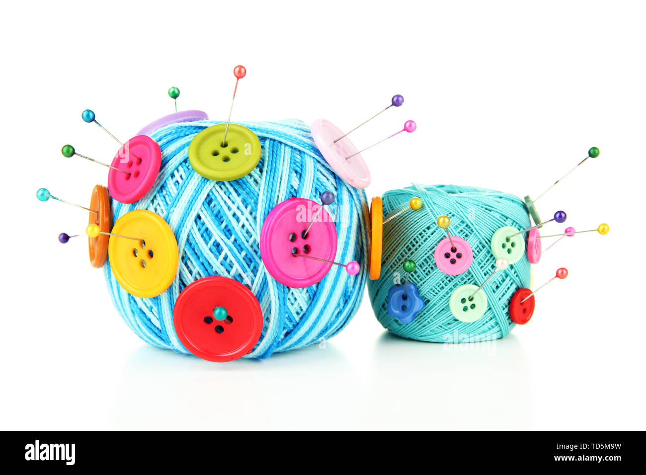 Colorful buttons and wool balls, isolated on white Stock Photo - Alamy