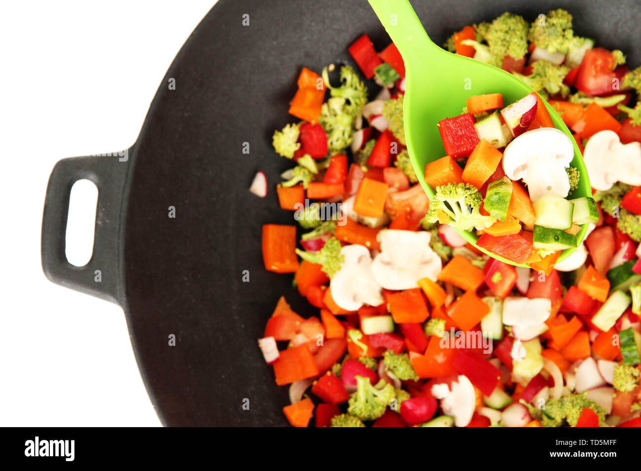 Vegetable ragout in wok, isolated on white Stock Photo - Alamy