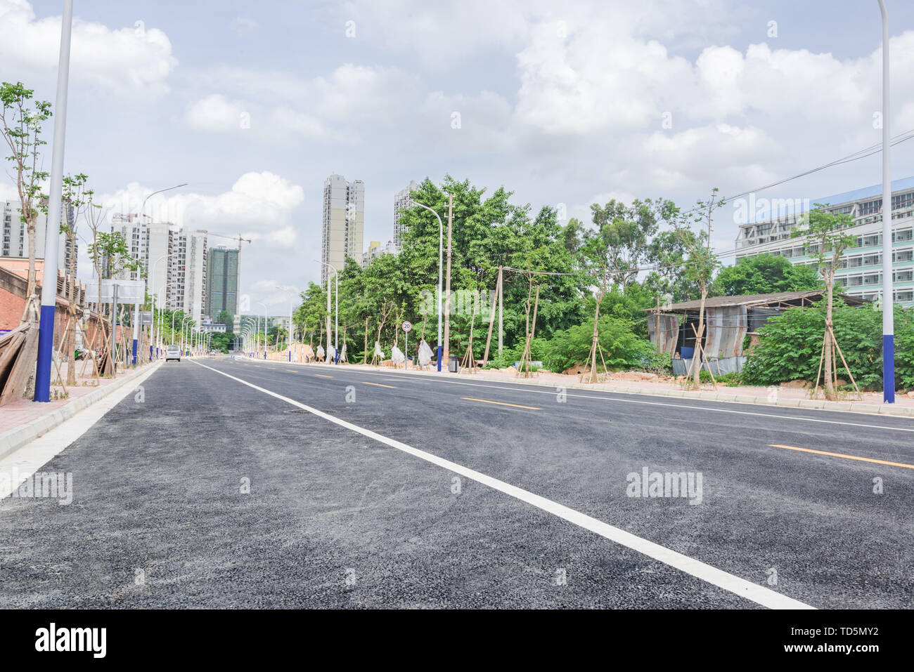 Suburban asphalt road Stock Photo - Alamy