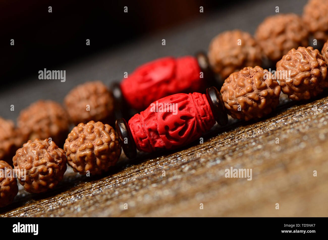 Cinnabar little King Kong Bodhi necklace wool chain Stock Photo - Alamy