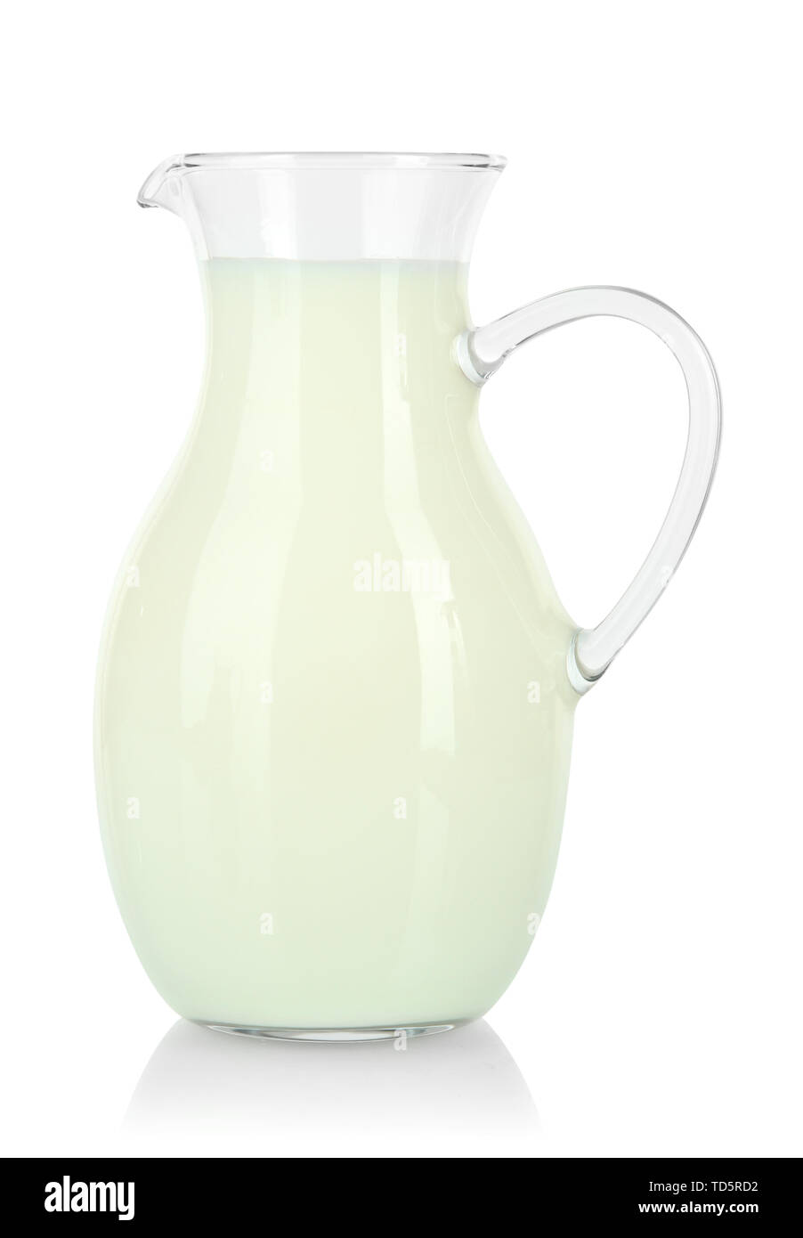 Milk pouring into pitcher Cut Out Stock Images & Pictures - Alamy