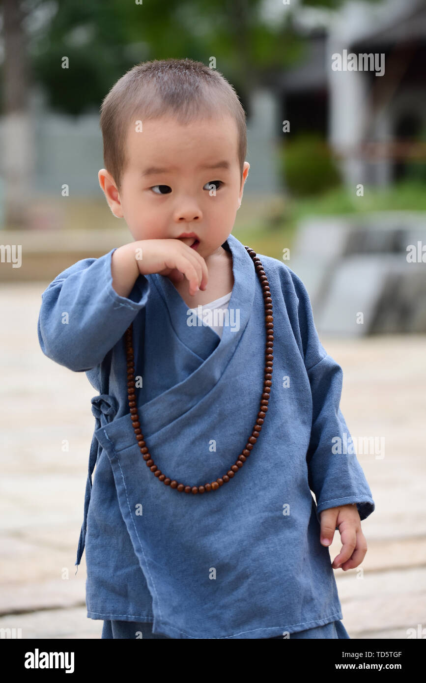 Cute little monk, children's photography Stock Photo - Alamy