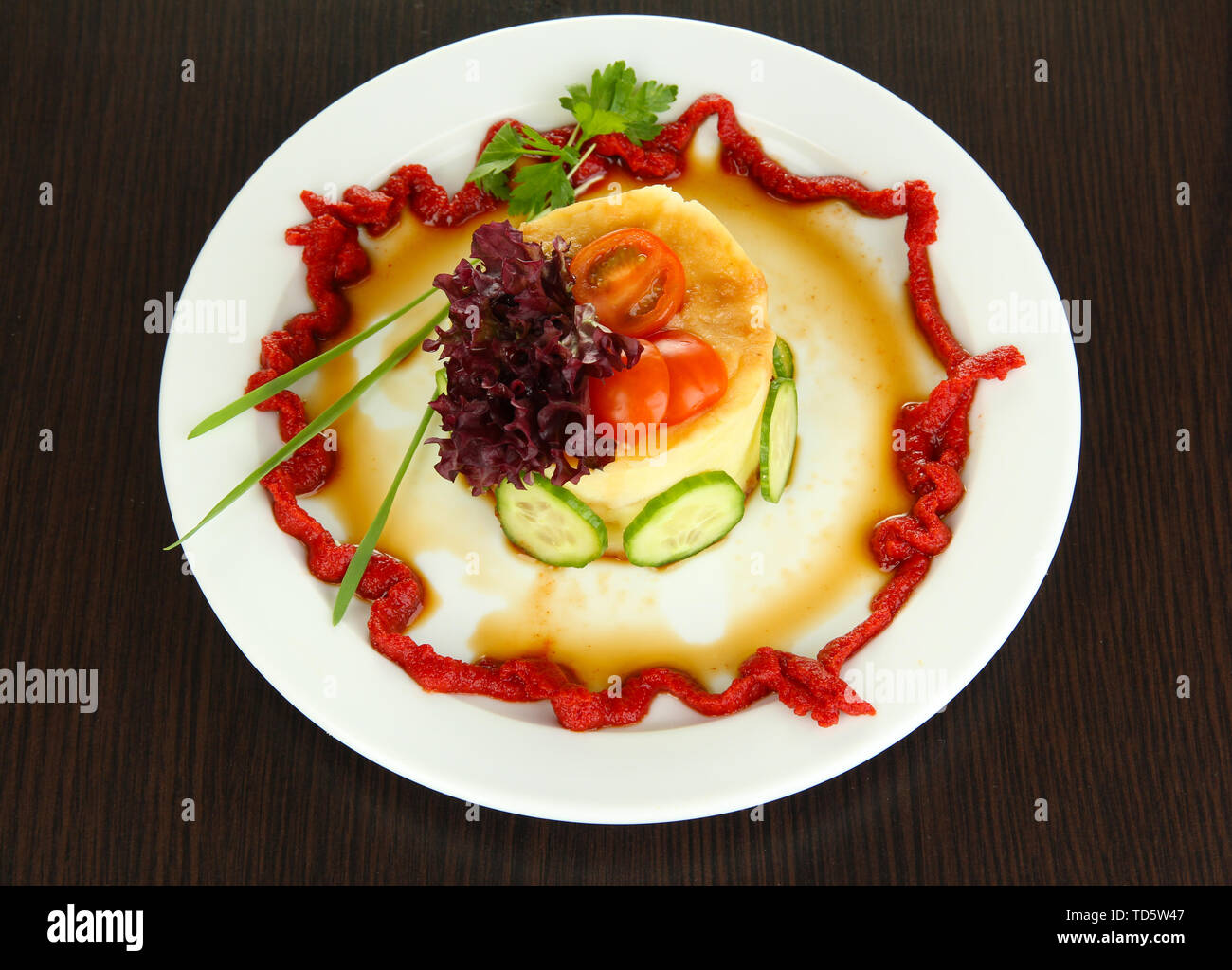 Small portion of food on big plate close up Stock Photo - Alamy