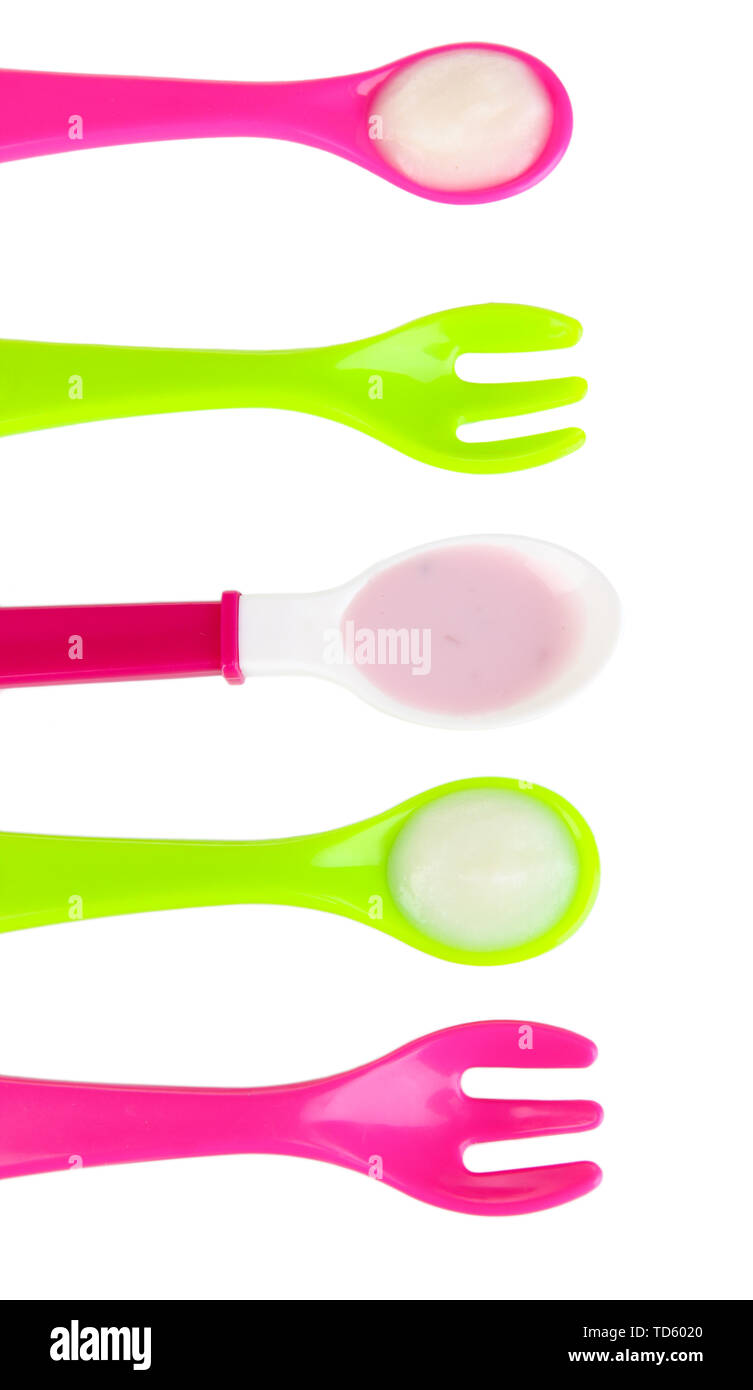 Color forks and spoons for baby food isolated on white Stock Photo - Alamy