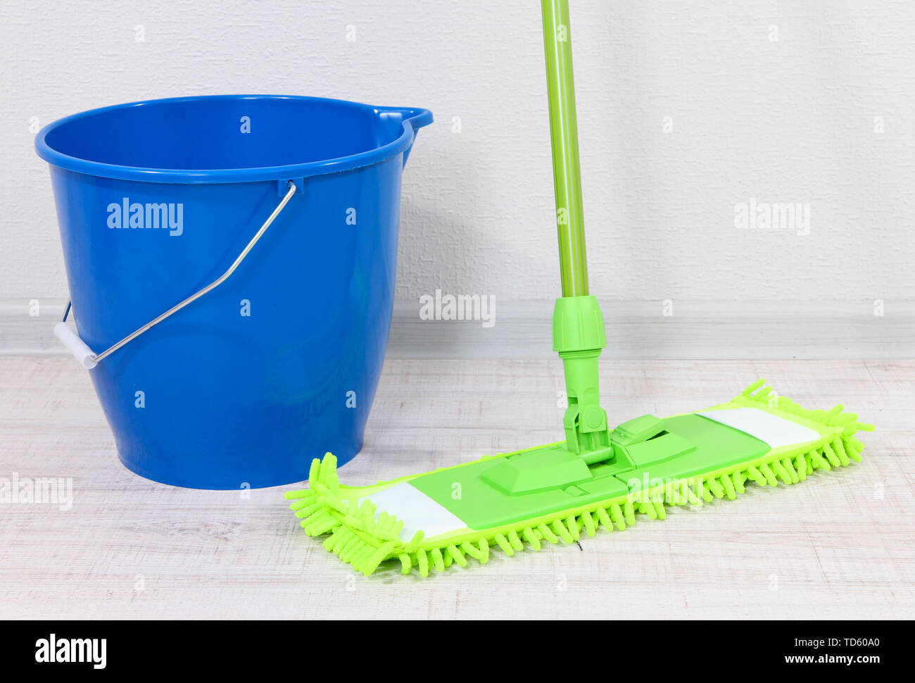 Washing the floor and all floor cleaning Stock Photo - Alamy