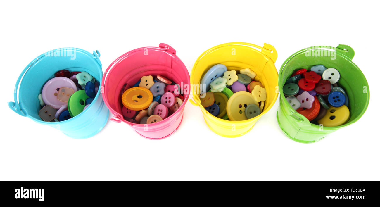 Colorful buttons in buckets isolated on white Stock Photo - Alamy