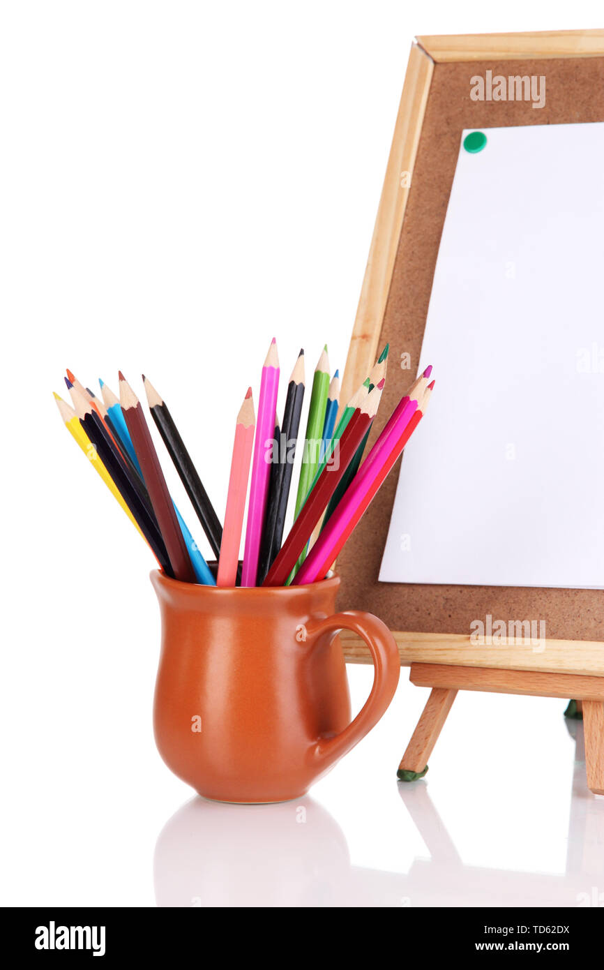 Small easel with sheet of paper with art supplies isolated on white ...