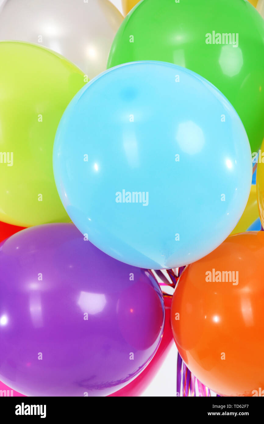 Many bright balloons isolated on white Stock Photo - Alamy