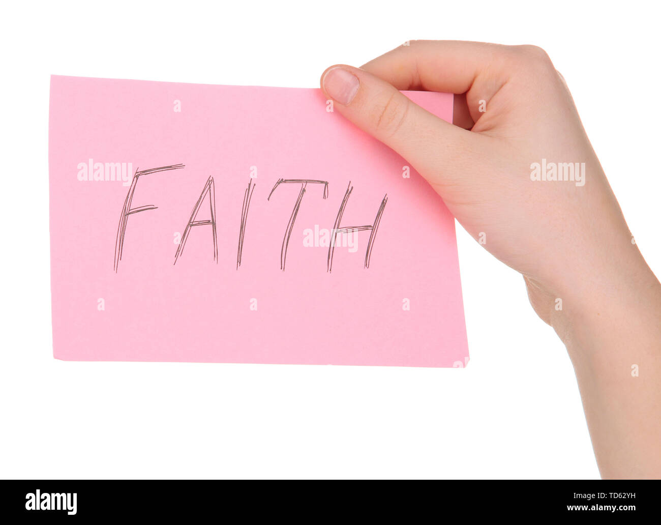 Faith word on piece paper in hand isolated on white Stock Photo - Alamy