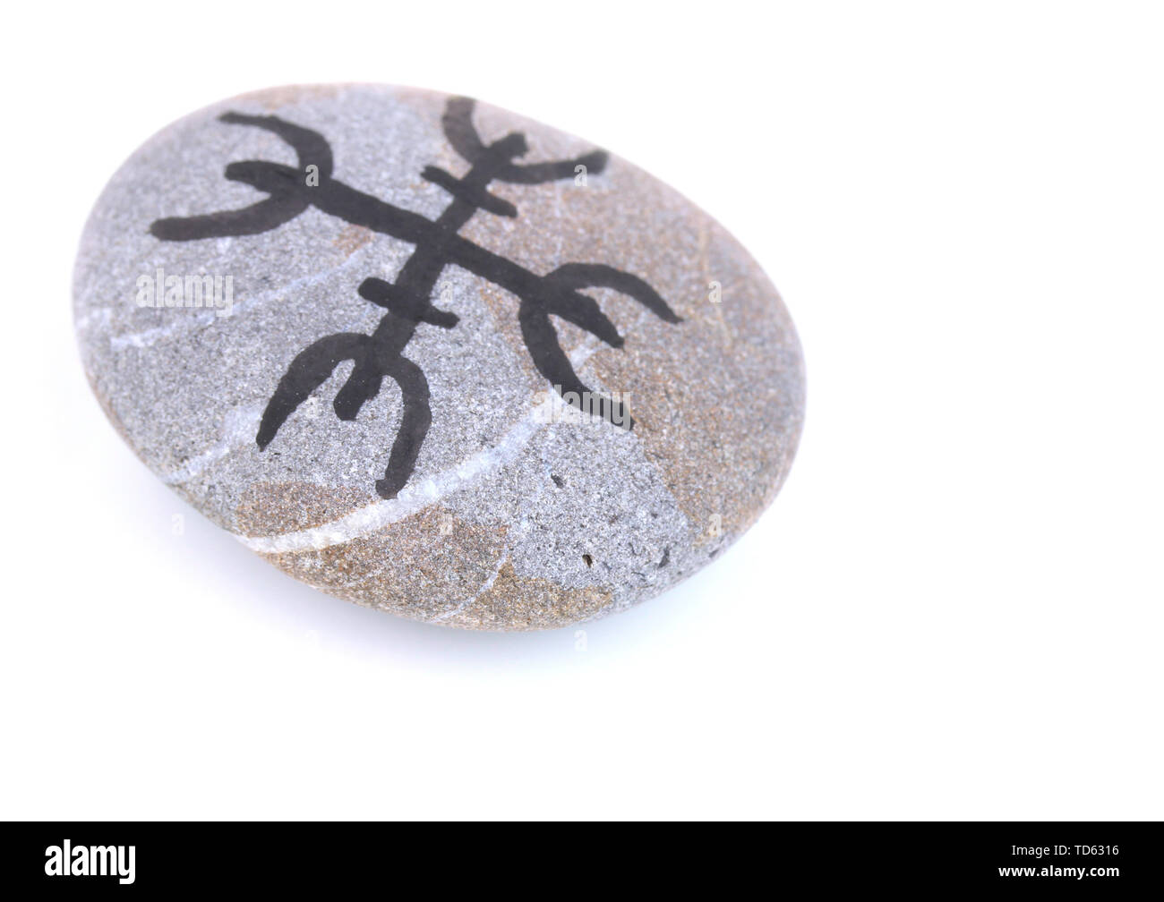 Fortune telling with symbols on stone isolated on white Stock Photo - Alamy