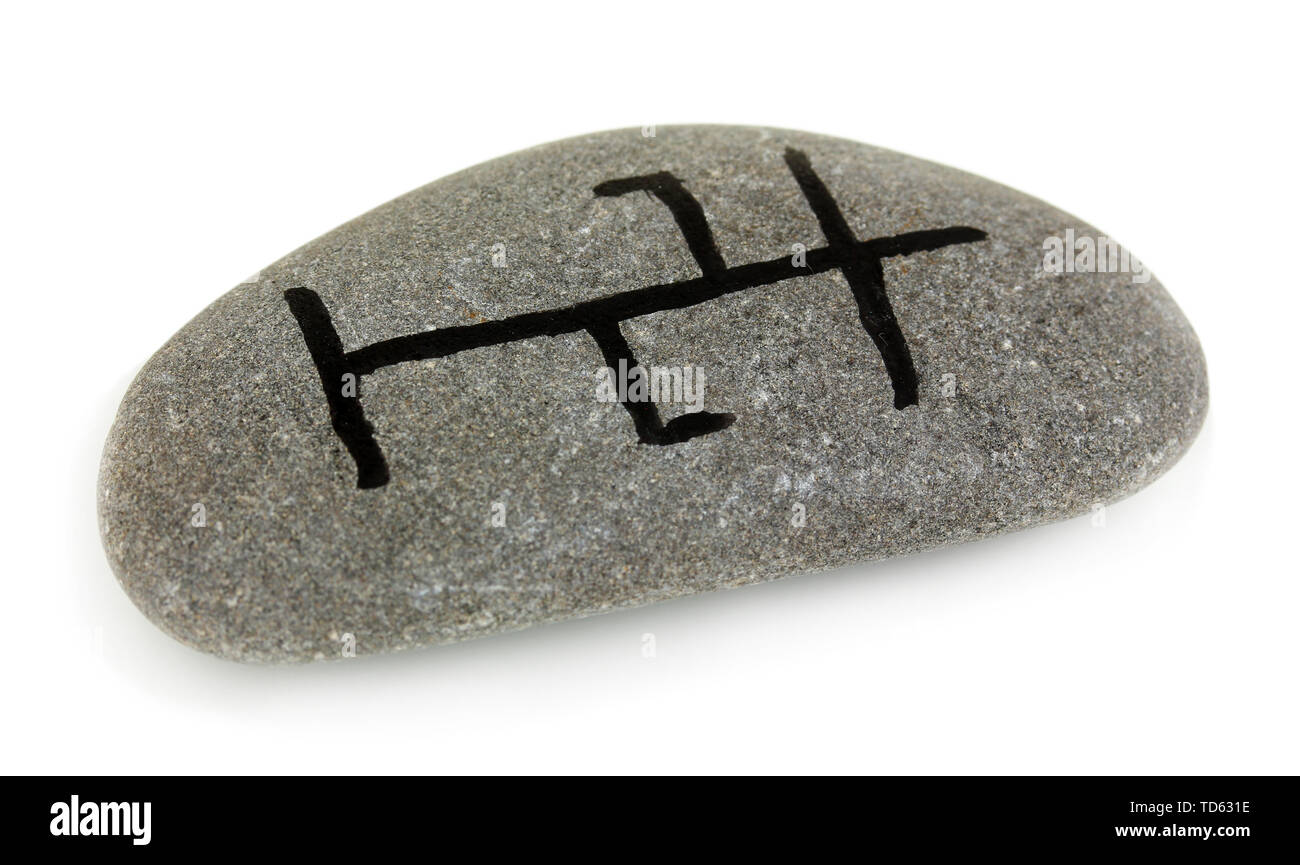 Fortune telling with symbols on stone isolated on white Stock Photo - Alamy