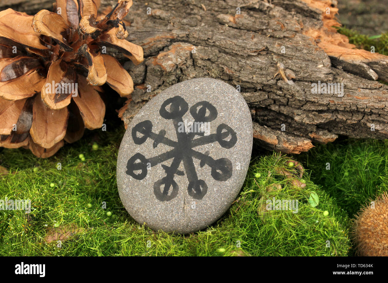 Fortune telling with symbols on stone close up Stock Photo - Alamy