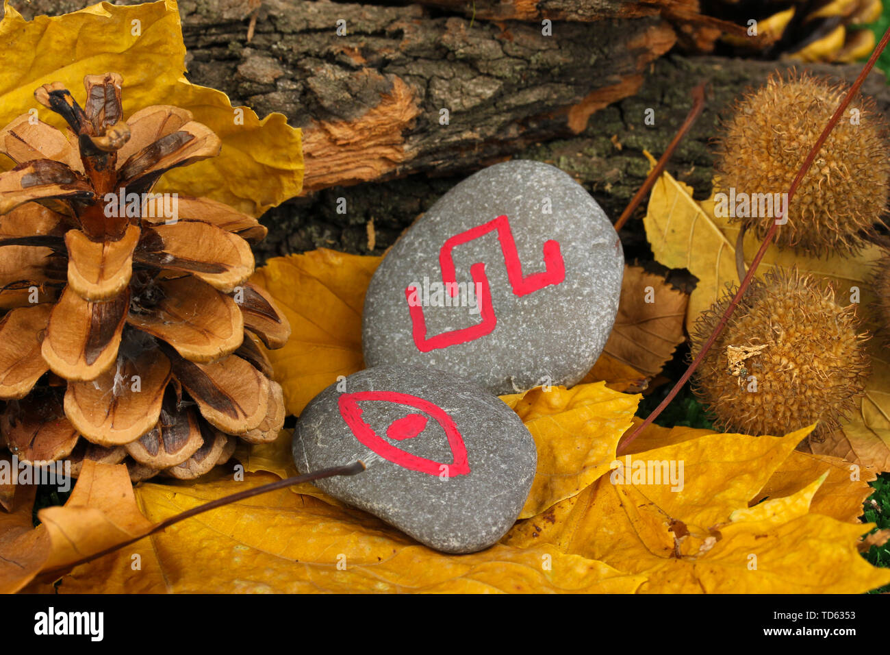 Fortune telling with symbols on stones close up Stock Photo - Alamy