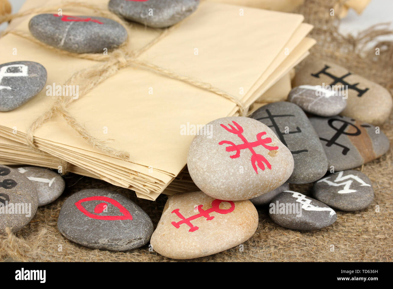 Fortune telling with symbols on stones on burlap background Stock Photo ...