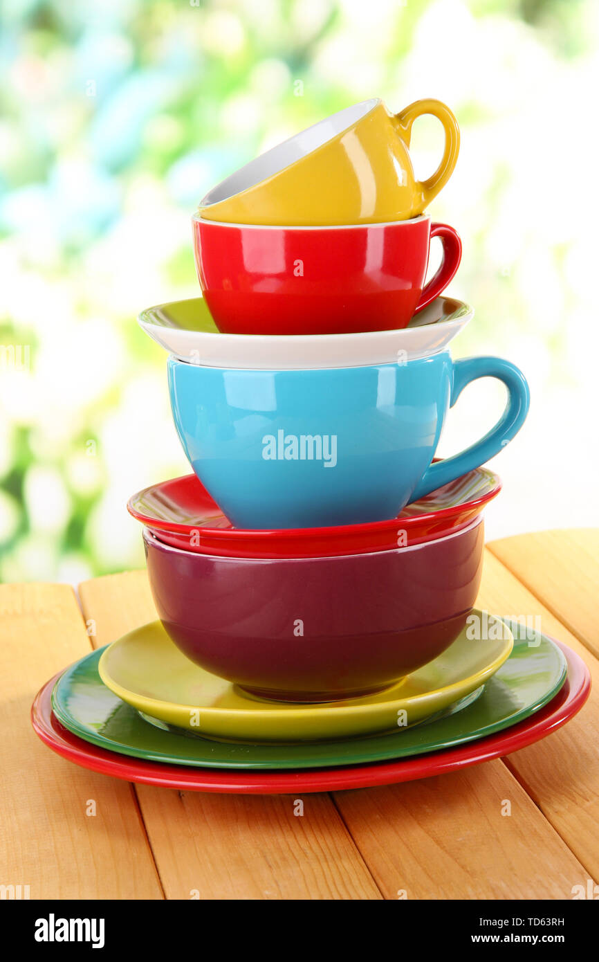 Mountain colorful dishes on nature background Stock Photo - Alamy