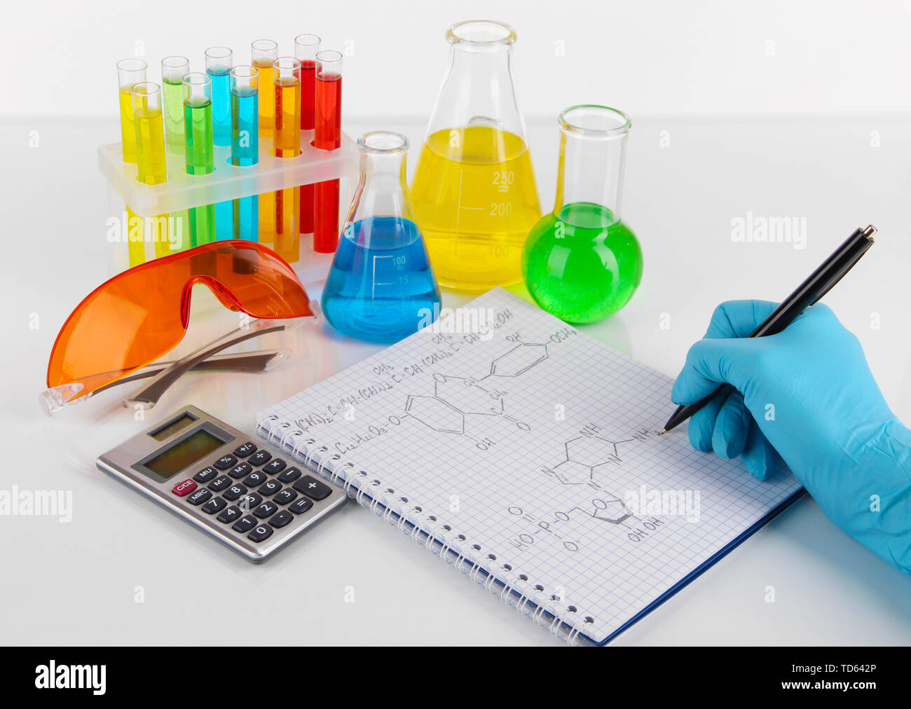 Hand scientist writing formulas isolated on white Stock Photo - Alamy